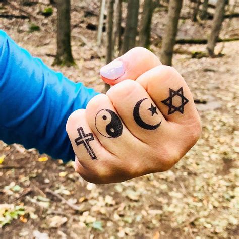 Religious Symbols Tattoos
