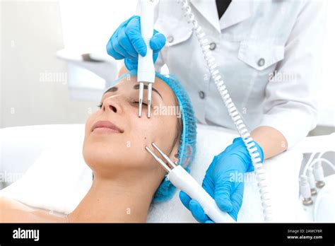 Portrait Of A Young Beautiful Girl Face Microcurrent Therapy Procedure