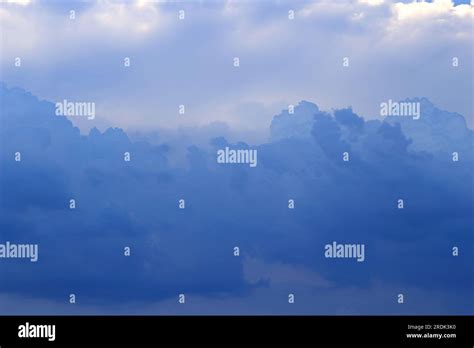 Clouds That Float In Alternating Layers Similar To Water Coloring