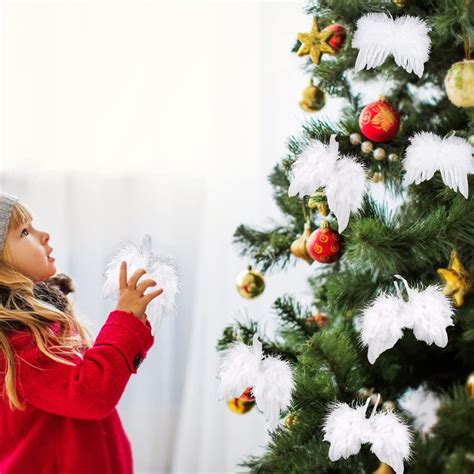 Set De 10 Decoratiuni Aripi De Ingeri Pentru Craciun Miss Good Pene Textil Alb 13 X 12 Cm