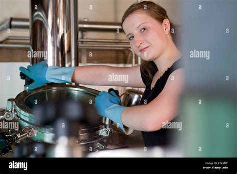 Female Brewer Working In Brewhouse Stock Photo Alamy