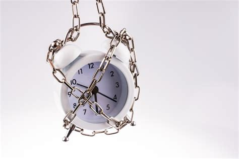 Premium Photo Alarm Clock In Chain Premium Photo Alarm Clock In Chain