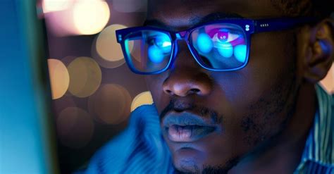 Premium Photo A Closeup Portrait Of A Black Man Working On A Computer
