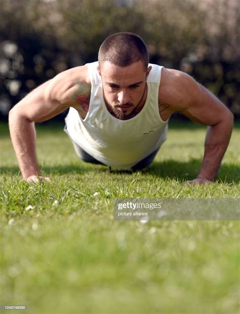 Transgender Model Benjamin Melzer Performs Push Ups In A Garden In News Photo Getty Images