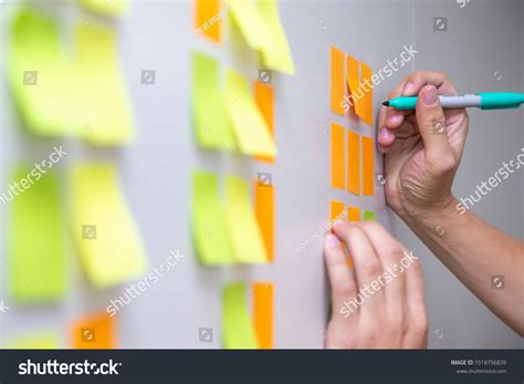 Worker Tracking His Tasks On Kanban Stock Photo Shutterstock
