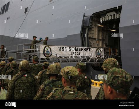 Soldiers Of Japan Ground Self Defense Force And Us Marines Board Uss