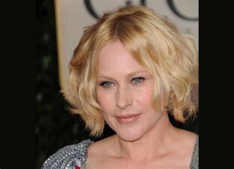 Patricia Arquettes Short Layered Haircut With Curls And Long Bangs