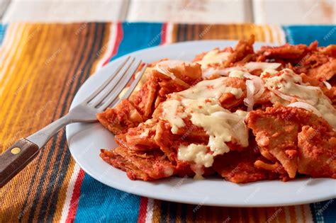 Mexican Red Chilaquiles Traditional Mexican Breakfast Premium Photo