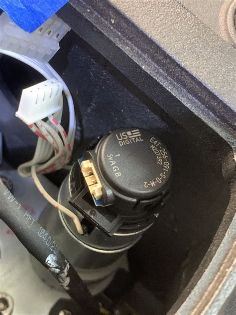assembled and capped new encoder note needs to sit on top of old