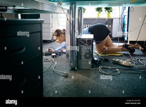 Woman Plugging Computer Hi Res Stock Photography And Images Alamy
