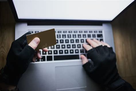 Laptop Credit Card And Hands Of Hacker For Cyber Crime Financial