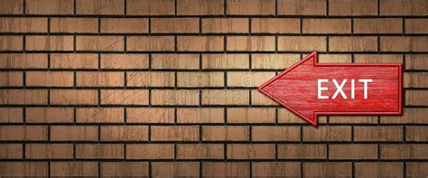 Red Wooden Shooter Sign With The Inscription EXIT Hangs On A Dark Brick Wall Left Arrow Pointer