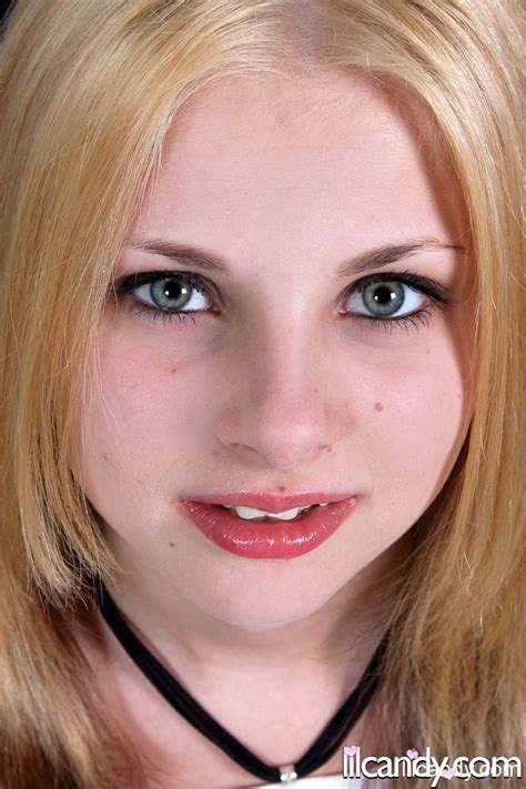 Petite Babe Lil Candy Poses In Her Sexy White Clothes Photos