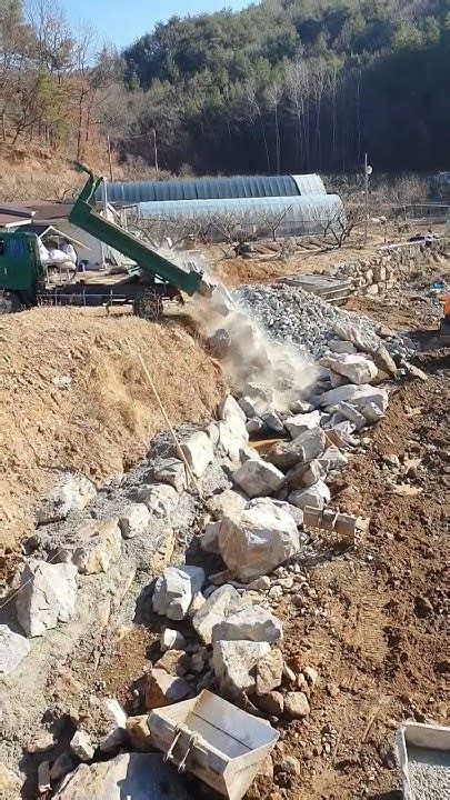발파석 석축 쌓기 Excavator Movie 미래종합중기 광양시굴착기 광양시미니굴착기 가스 상하수도 미래건설중기 장지조성 철거 지중화 사방 조경 토공사 땅 Jeong