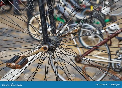 An Image Of A Large Old Fashioned Bicycle Wheel And Pedals Stock Image