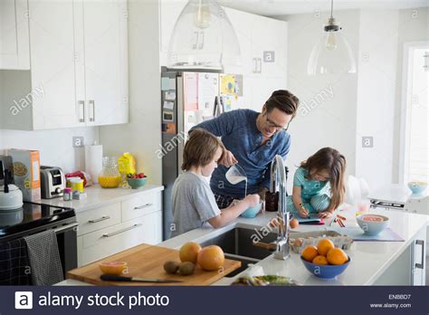 Hispanic father son in kitchen hi-res stock photography and images - Alamy