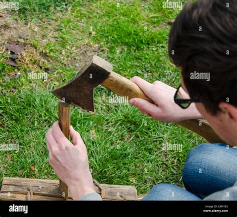 Cutting Tree With Axe Hi Res Stock Photography And Images Alamy