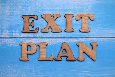 exit plan text words typography written on wooden background life and