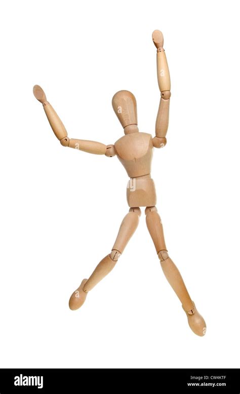 Wooden Artists Mannikin Leaping In The Air Isolated Against White Stock