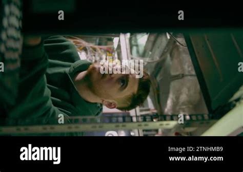 Focused Hacker Data Center Hacking Software System Vulnerable Cyber Security Server Room