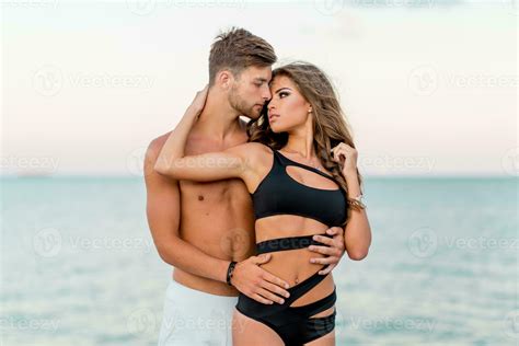 Outdoor Close Up Fashion Portrait Of Pretty Sexy Couple In Love Hugs On