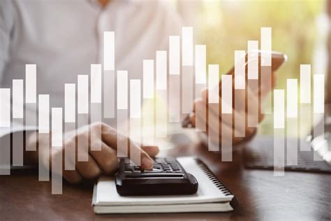 Premium Photo Men Use The Calculator And Take Notes With Calculations