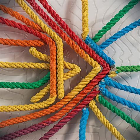 Collaborative Colourful Ropes Forming An Arrow Of Direction Premium Ai Generated Image