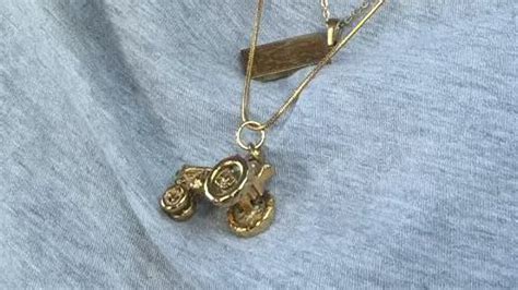 Amazon Delivery Driver Loses Gold Tractor Pendant On Her Route