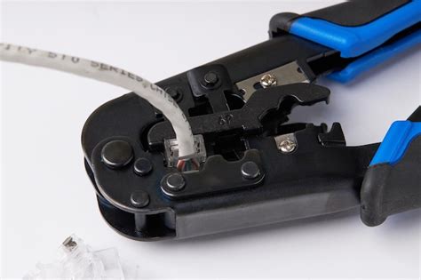 Premium Photo Modular Plug Crimper For Network Or Ethernet Cable On White Background