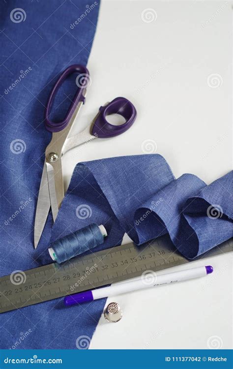 Measuring And Cutting Textile Scissors And Violet Linen Fabric Stock