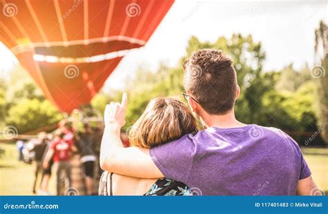 Happy Couple In Love On Honeymoon Excursion Waiting For Hot Air Stock