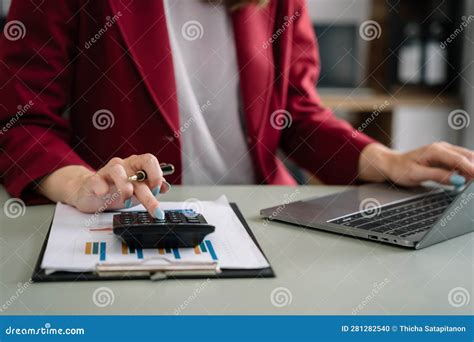 Women Are Using Calculators To Calculate Office Income Stock Photo Image Of Corporate
