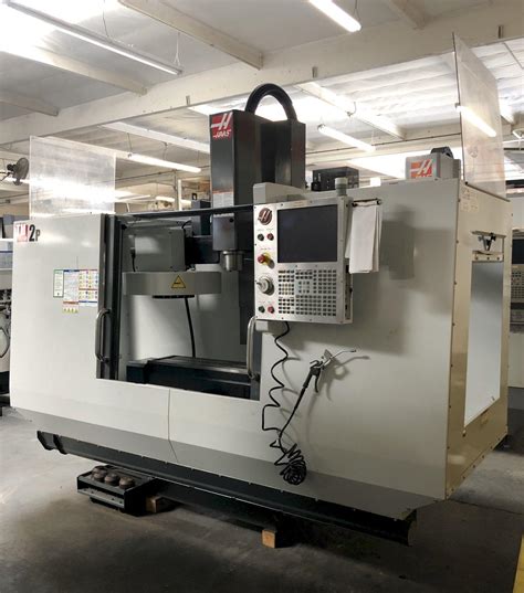 Haas Tm 2p Cnc Toolroom Mill 3 Axis 6k Rpm Ct40 Taper 10 Tool Capacity Carousel Programable Haas Tm 2p Cnc Toolroom Mill 3 Axis 6k Rpm Ct40 Taper 10 Tool Capacity Carousel Programable