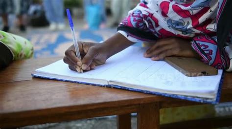 chinese teacher earns praises for teaching chinese language in tanzania