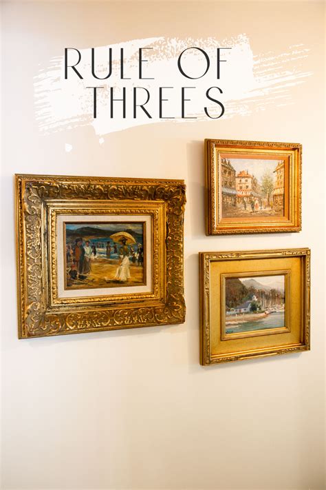 rule of threes picture gallery wall hanging pictures on the wall