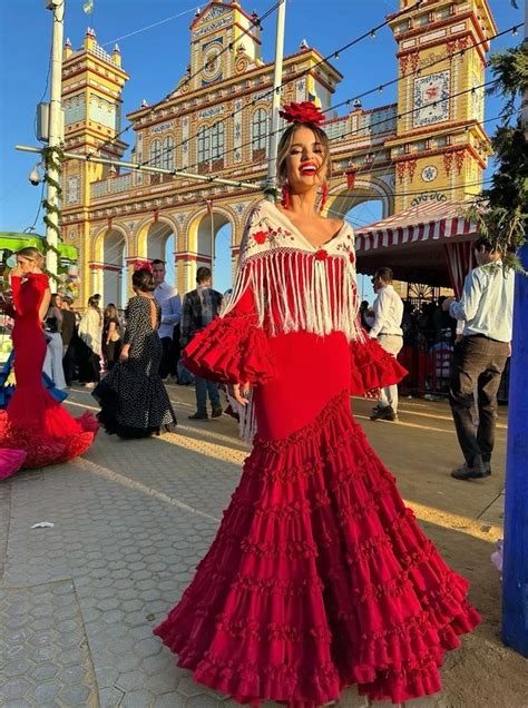 Seville A City Of Light And Color Trajes De Feria Outfits Feria Trajes De Sevillana