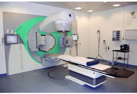 A Linear Accelerator The Gantry Is Shown Above The Table Depending On