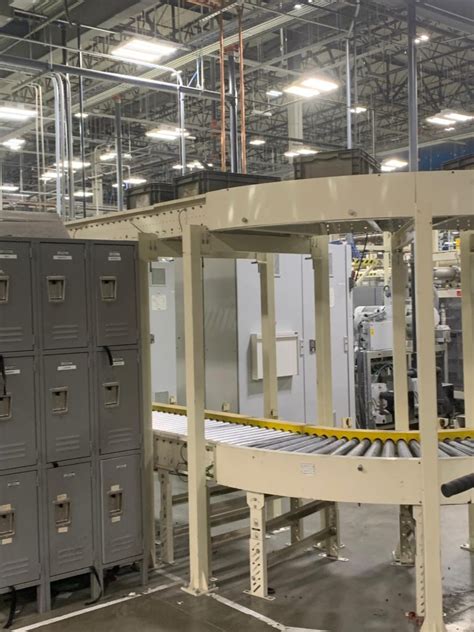 Conveyor System For Robotic Palletizing Cell At Paper Goods Manufacturer J H Automation Solutions