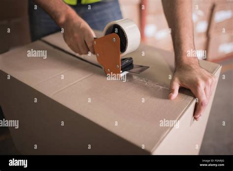 Worker Preparing Goods For Dispatch Stock Photo Alamy