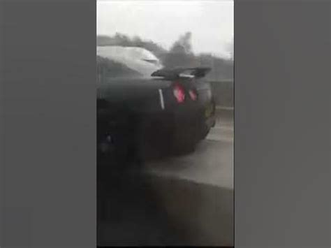 nissan gtr R35 in rain backfire and exhaust sound with fireballs - YouTube