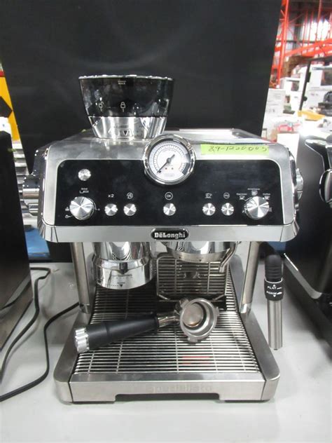 MACHINE À ESPRESSO DELONGHI “LA SPECIALISTA” - Continental Auctioneers