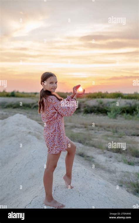 Beautiful Teenage Girl Walks Barefoot On A Country Holiday On A Day Off