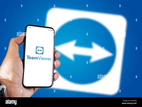 New York USA September 2021 Hand Holding A Phone With The Teamviewer App On The Screen And