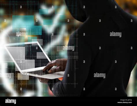 Back View Of Hacker Using A Laptop Stock Photo Alamy