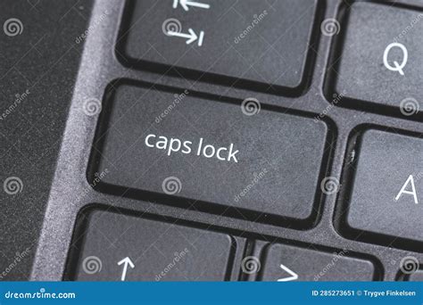 caps lock key on a black laptop keyboard stock image image of open