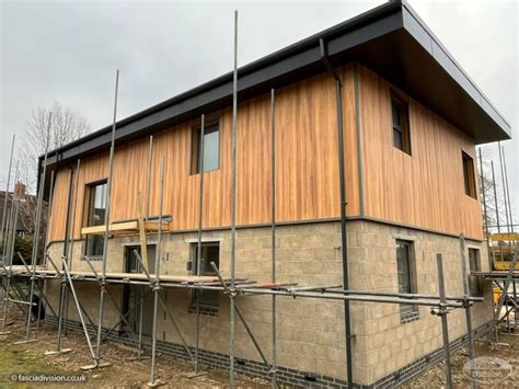 Red Cedar Durasid Foresta Cladding And Anthracite Fascia Soffits And Guttering The Fascia