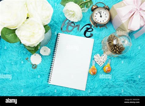 Flat Lay Mock Up Space Notebook Paper With Alarm Clock And Peony Flower