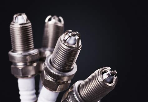 Premium Photo | Ignition spark plug with platinum electrode. Automotive