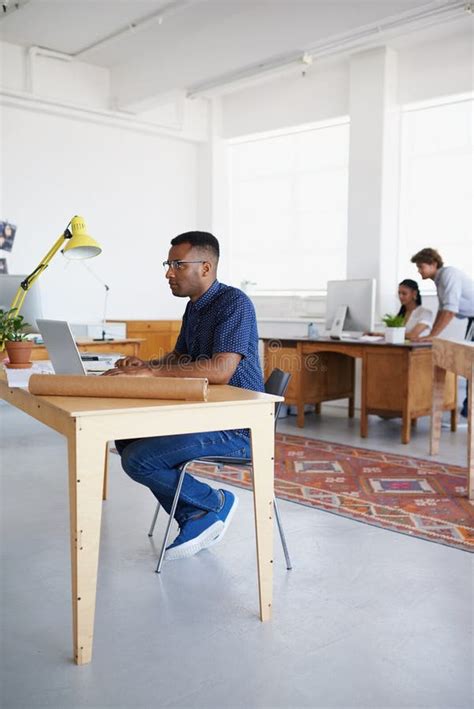 civil engineering blueprint or black man typing on laptop working on