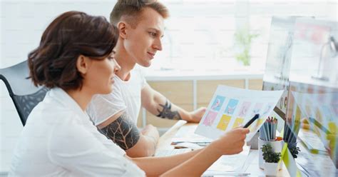 Web Designers Working On Project On Computer In Modern It Office Team Developing Web Design